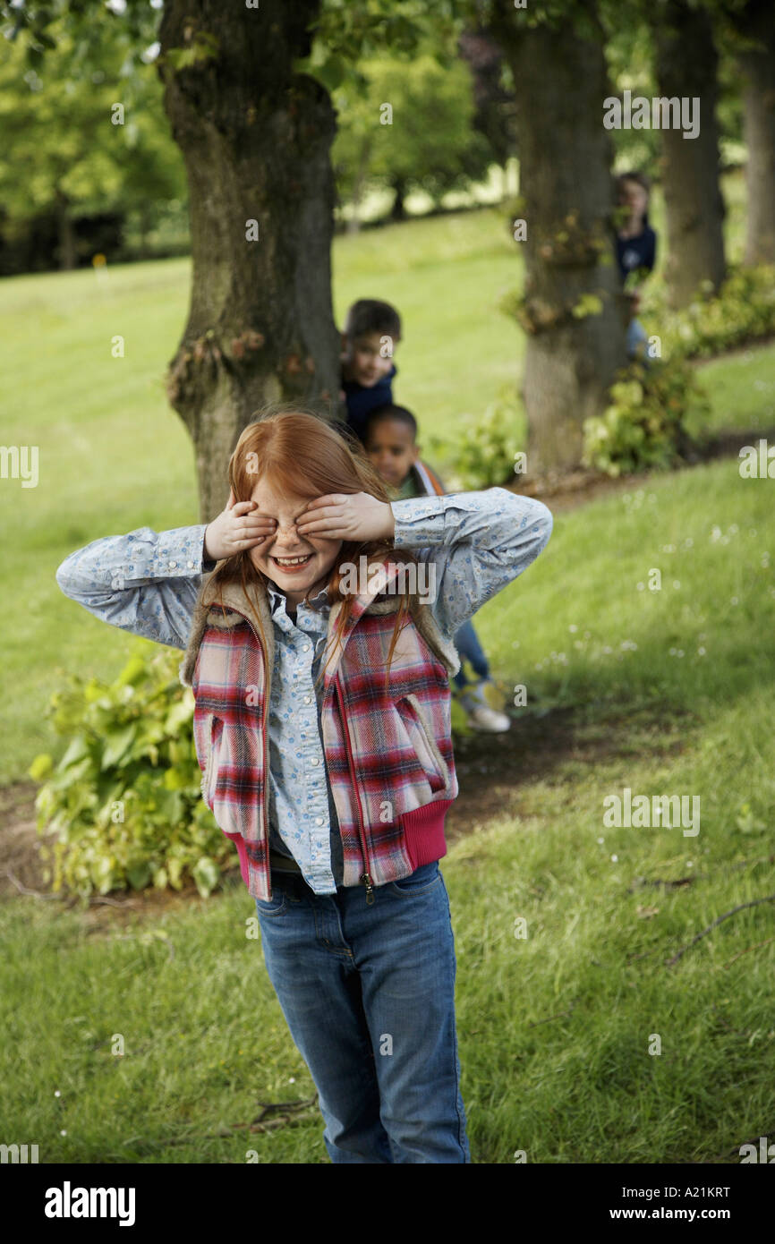 Children Playing Hide And Seek Park High Resolution Stock Photography ...