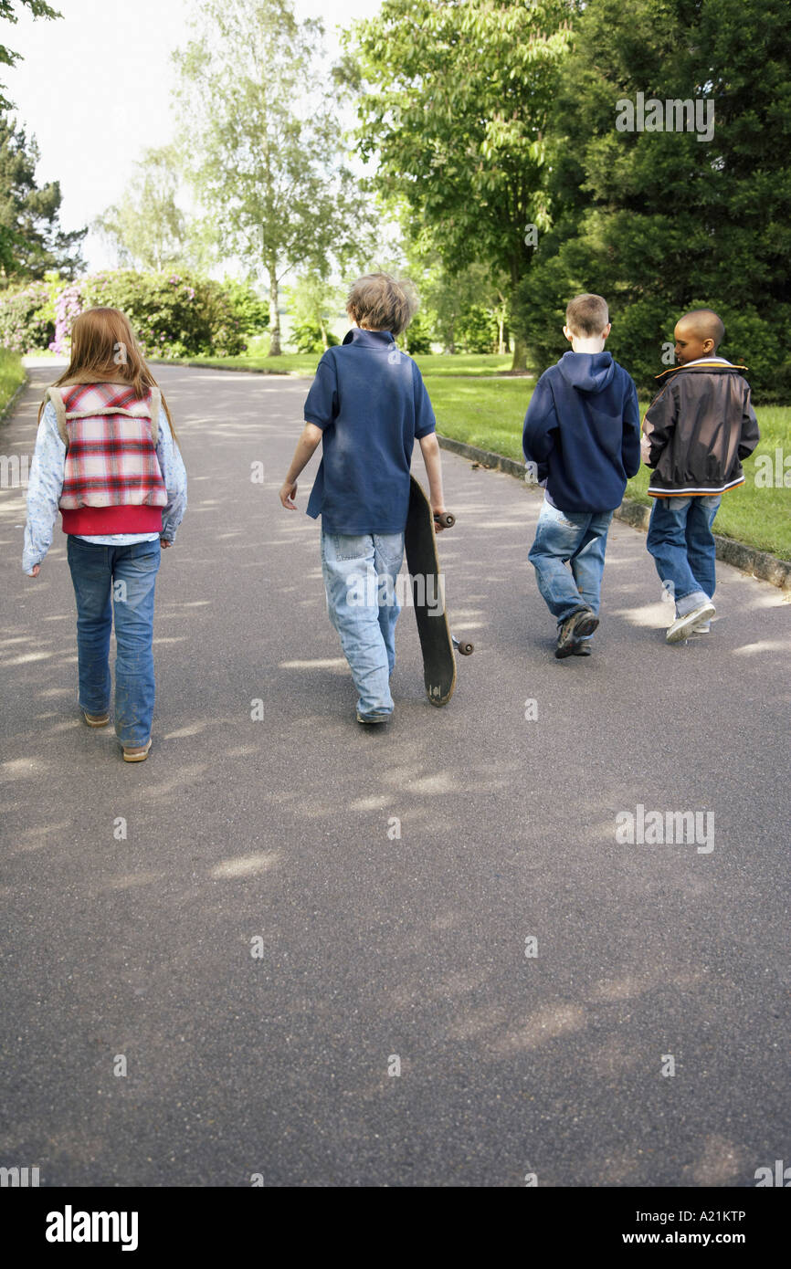 American children walking along street hi-res stock photography and ...