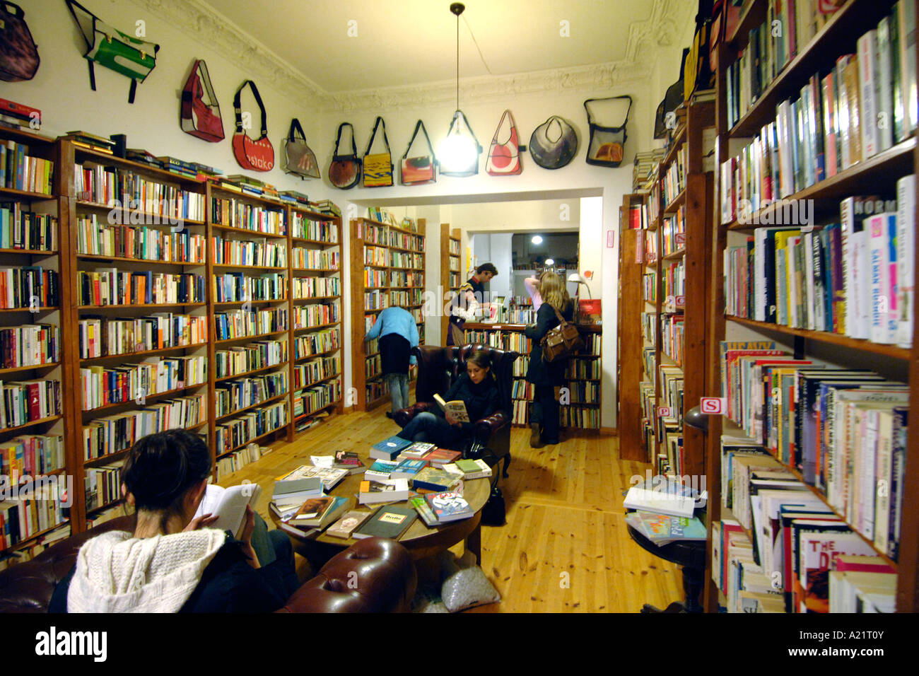 Two girls reading inside the St Georges English Bookshop in East Berlin ...