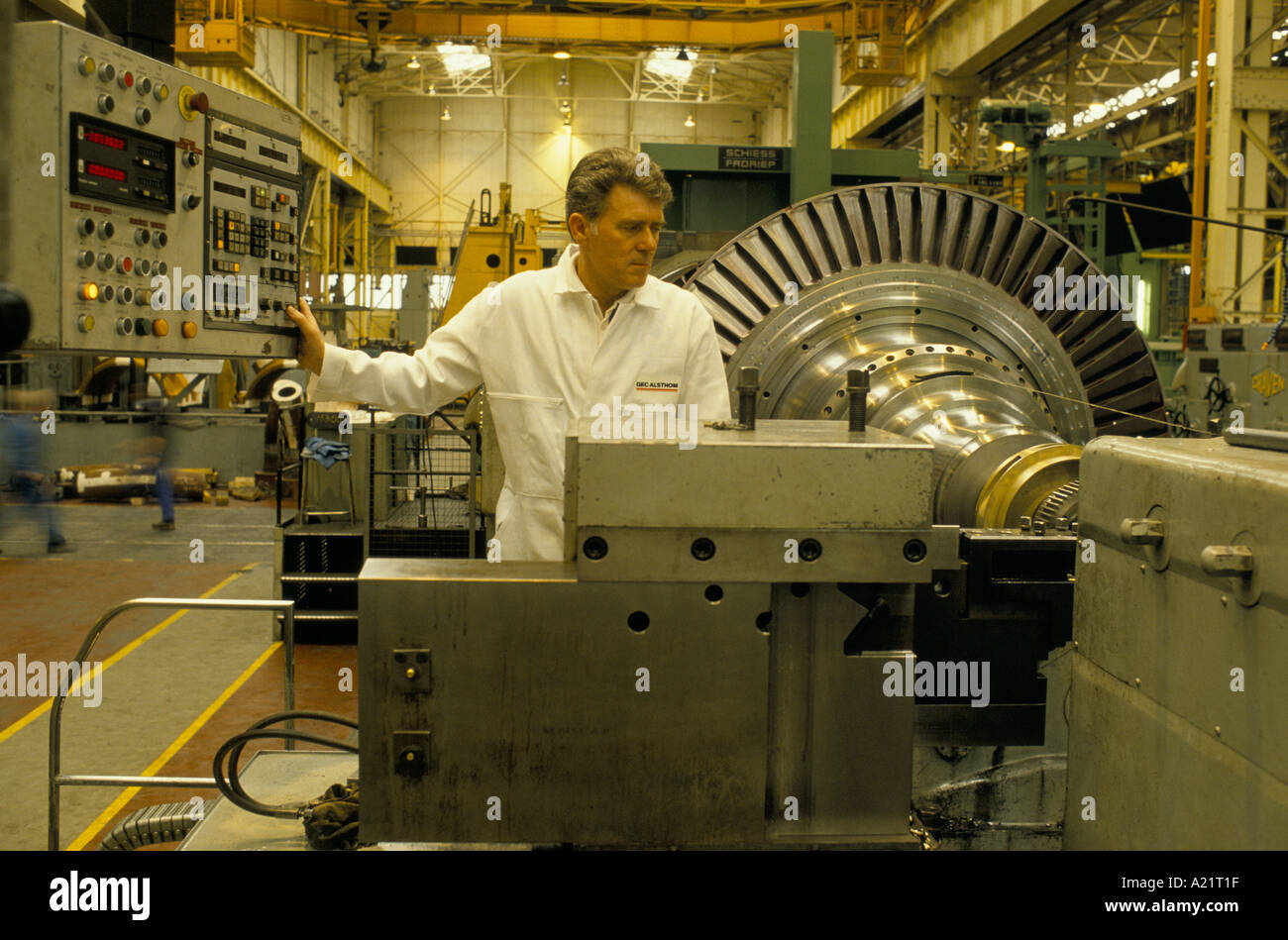 A worker monitoring turbine production, GEC, Alsthom, Rugby ...