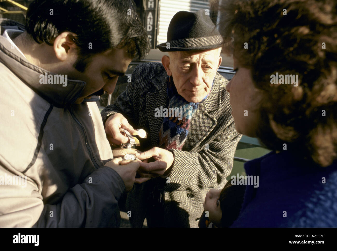 A man selling watches in Brick Lane market, London, UK Stock Photo - Alamy