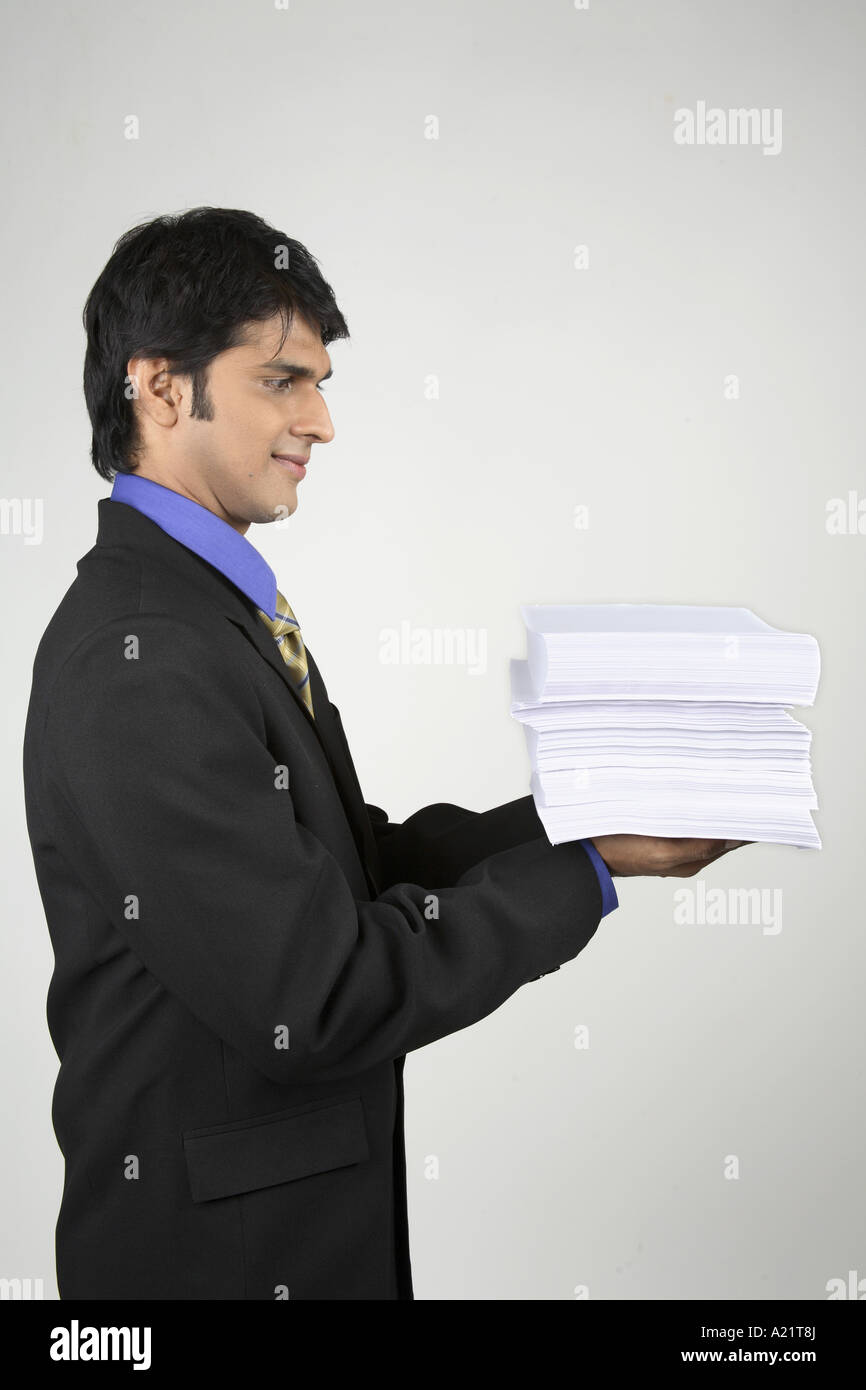 Holds bundles hi-res stock photography and images - Alamy