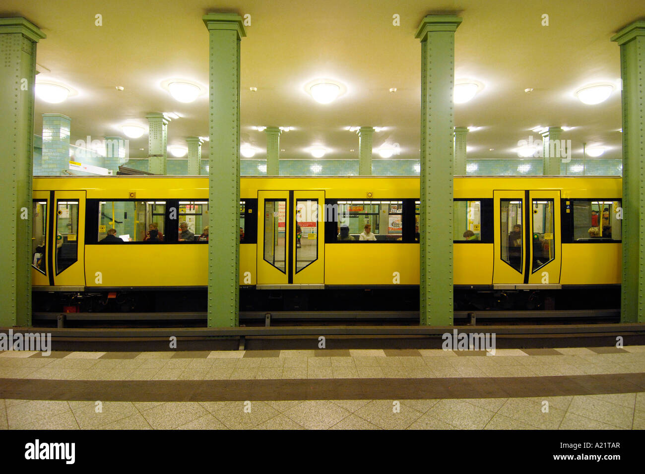 Yellow U bahn train at the Alexanderplatz station in East Berlin Stock ...