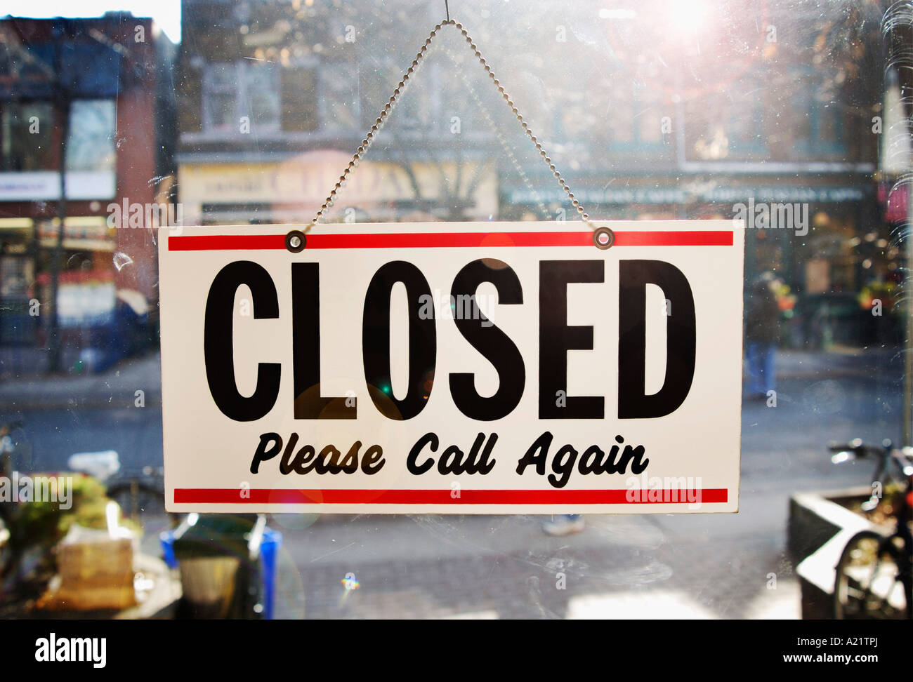 Closed Sign Hanging in Shop Window Stock Photo - Alamy