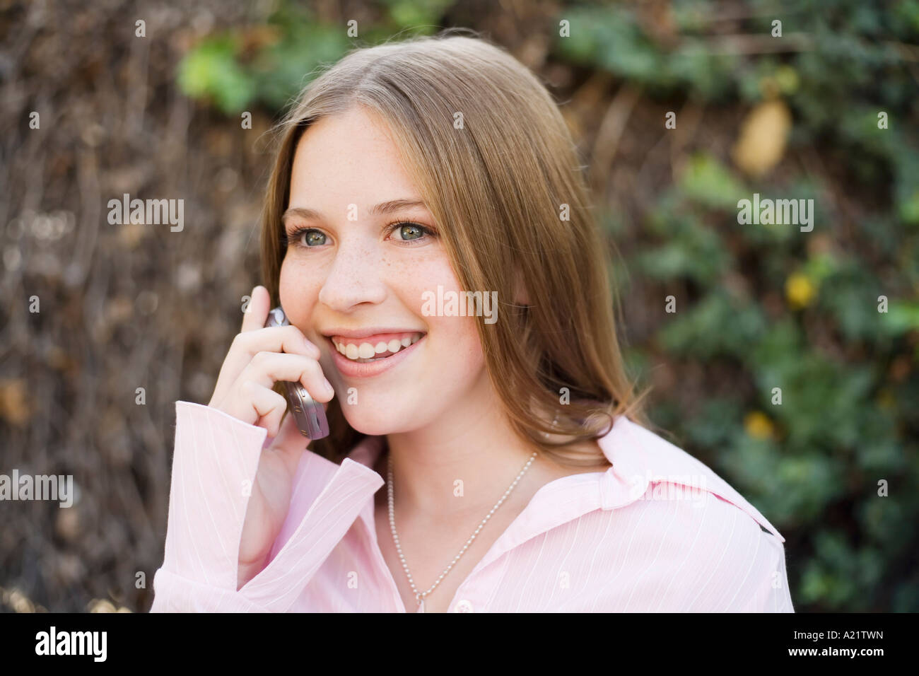 Girl Using Cellular Phone Stock Photo - Alamy