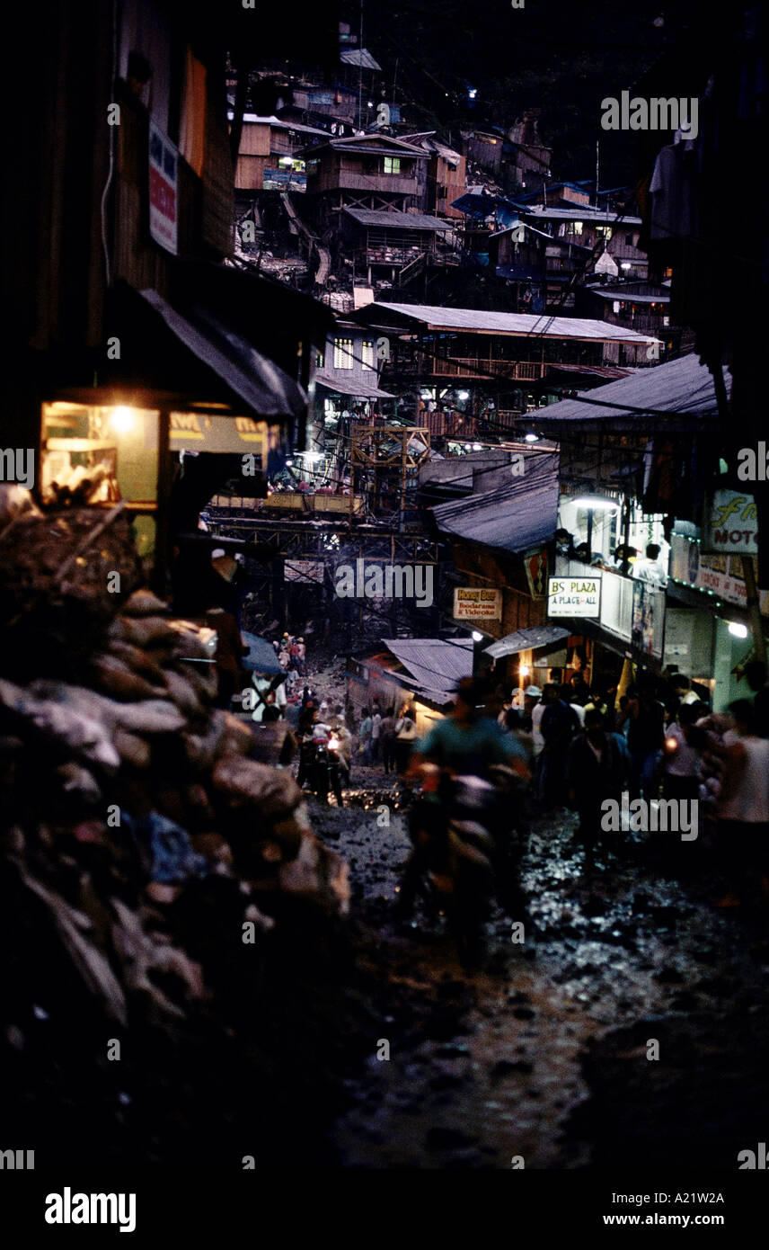 The main street of Mount Diwata in the rain, Mindanao, The Philippines ...