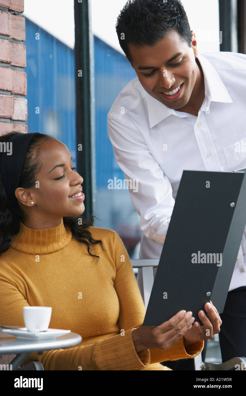 Asian woman in restaurant talk with waiter hi-res stock photography and ...