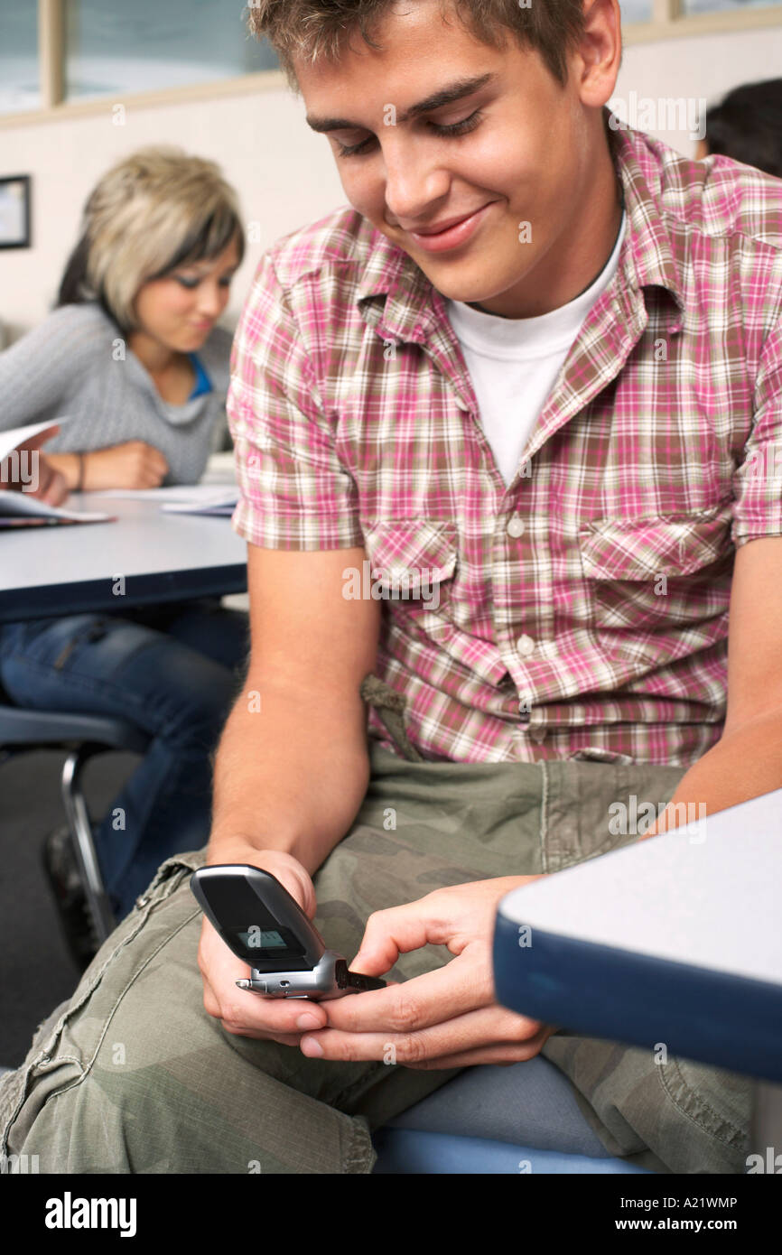 Teen cell phone classroom hi-res stock photography and images - Alamy