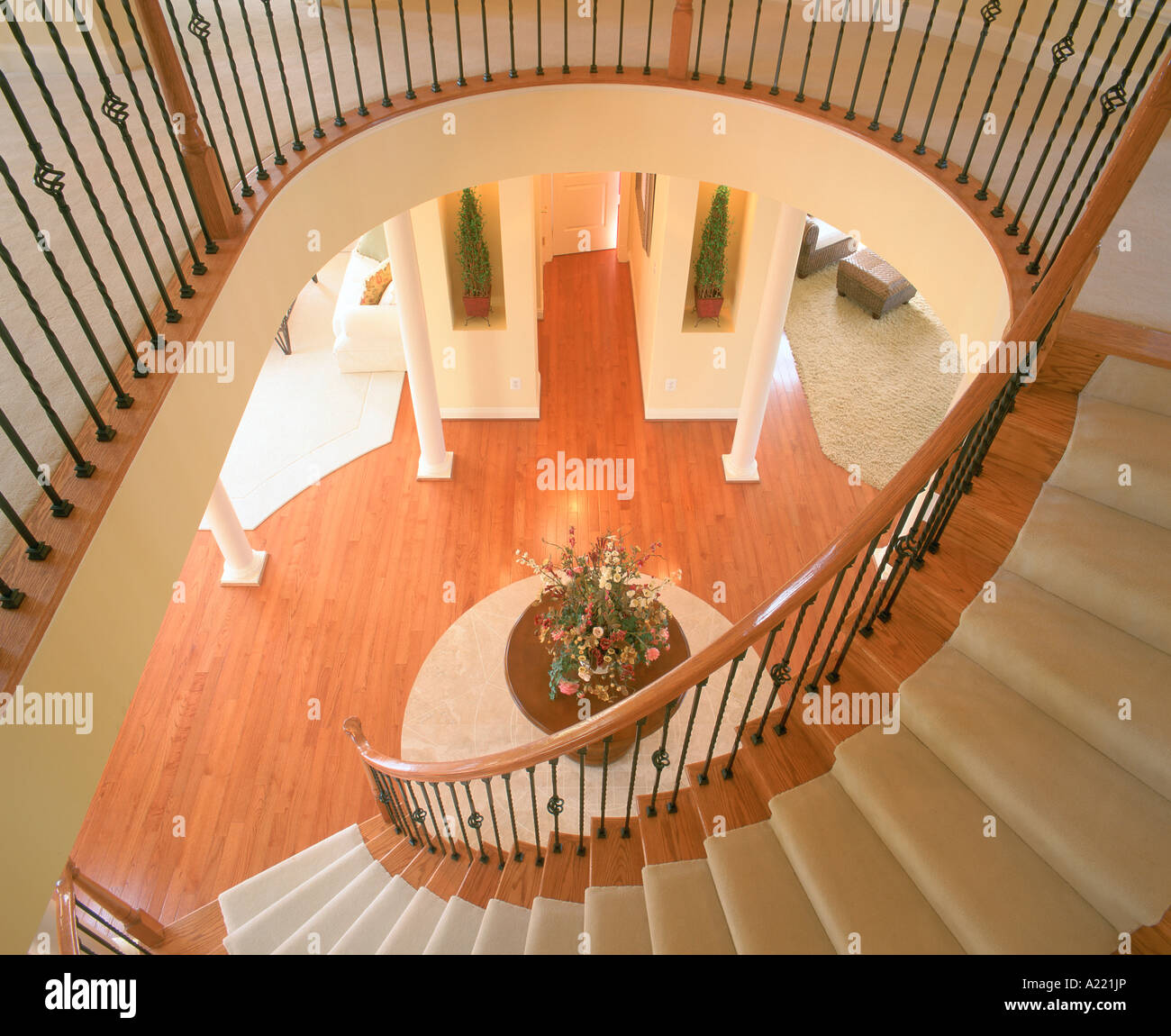 Looking down a large spiral staircase Stock Photo - Alamy