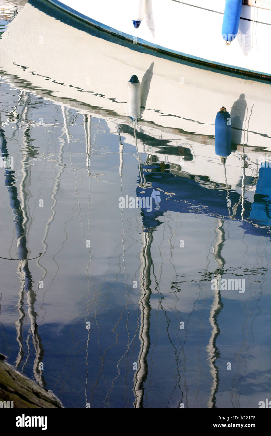 Reflections of a sailing yacht Stock Photo - Alamy