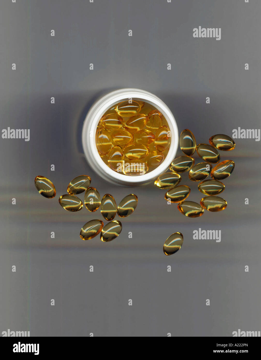 Omega 3 capsules contain fatty acids from fish oils Stock Photo - Alamy