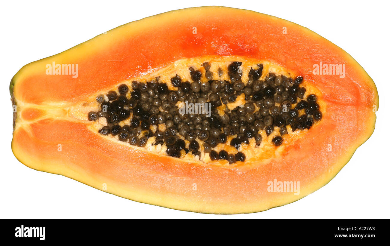Papaya fruit split in half, on white background Stock Photo - Alamy