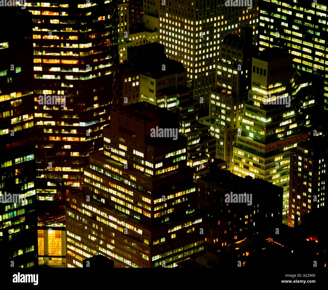 Office buildings illuminated at night Manhattan New York City USA N ...