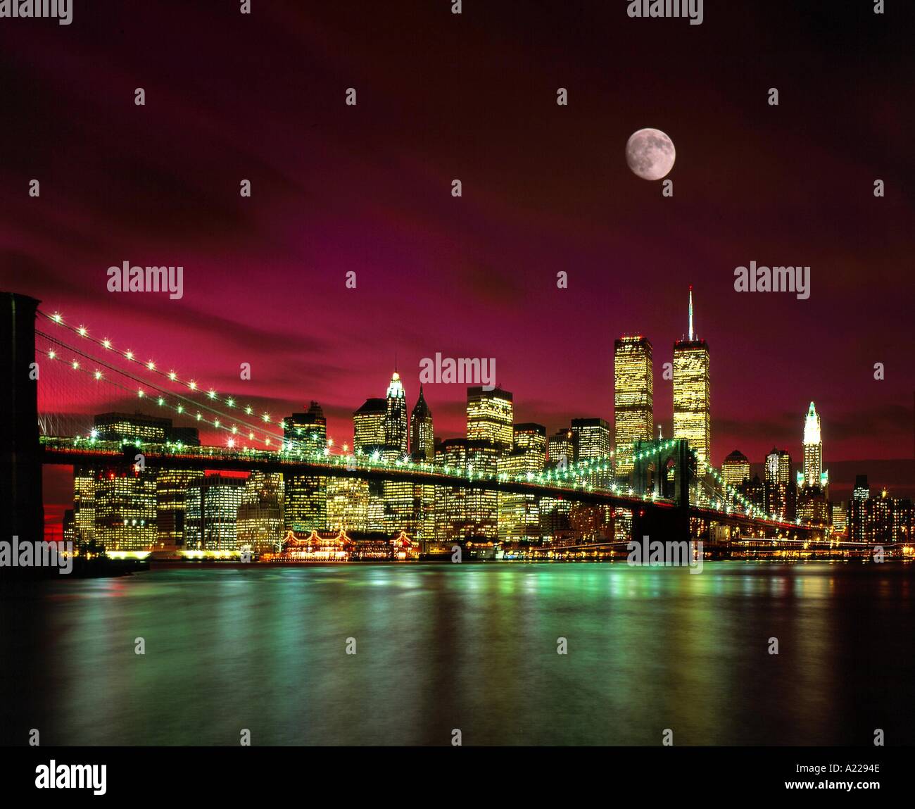 Brooklyn Bridge and the Manhattan skyline illuminated under a full moon ...