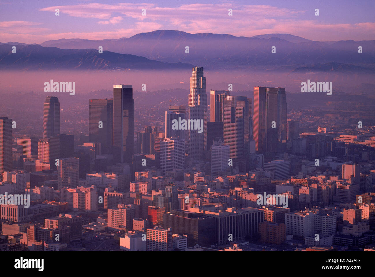 Smog hanging over downtown Los Angeles skyline at dusk California USA N ...