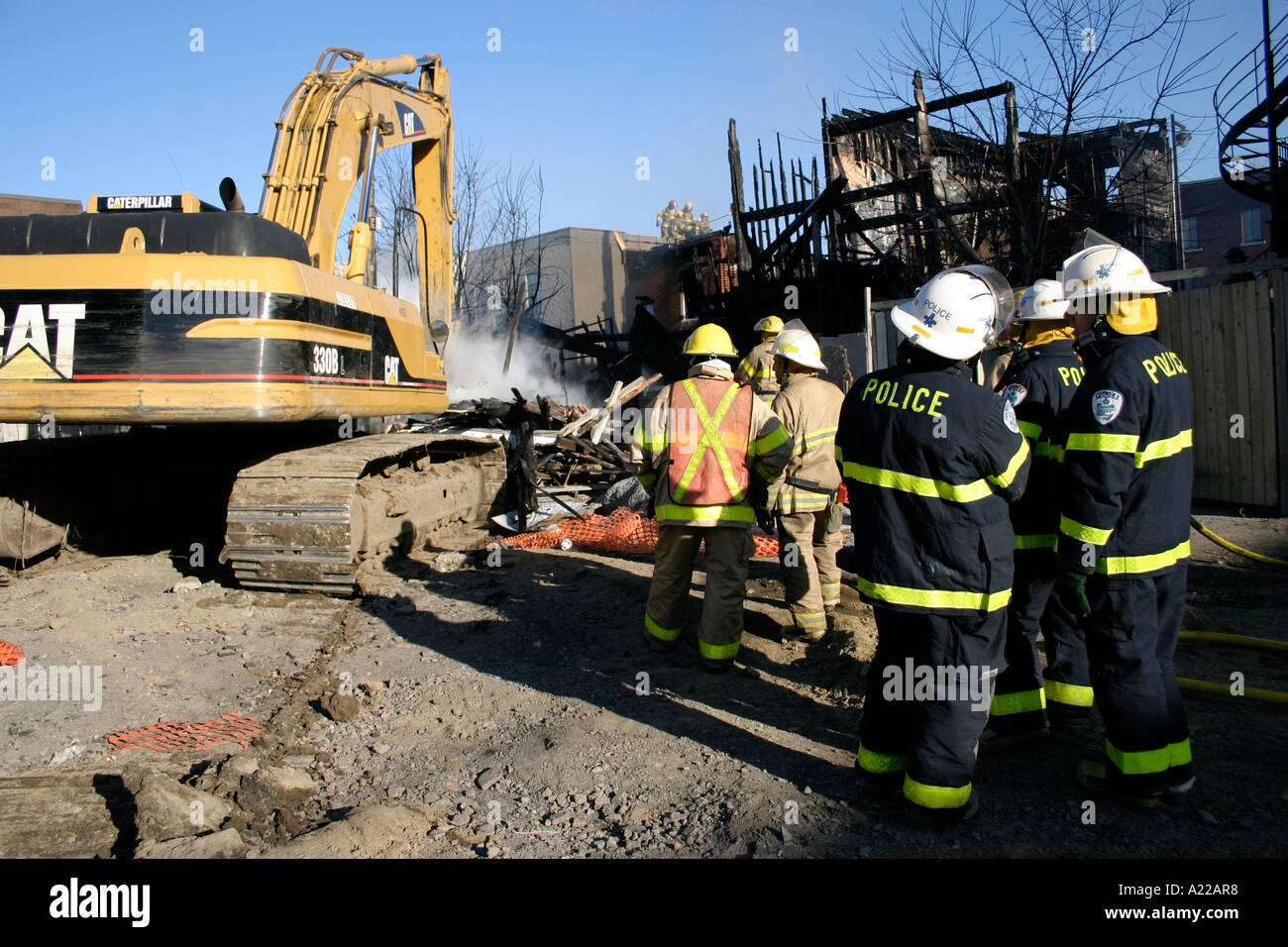 Firemen in action Stock Photo - Alamy
