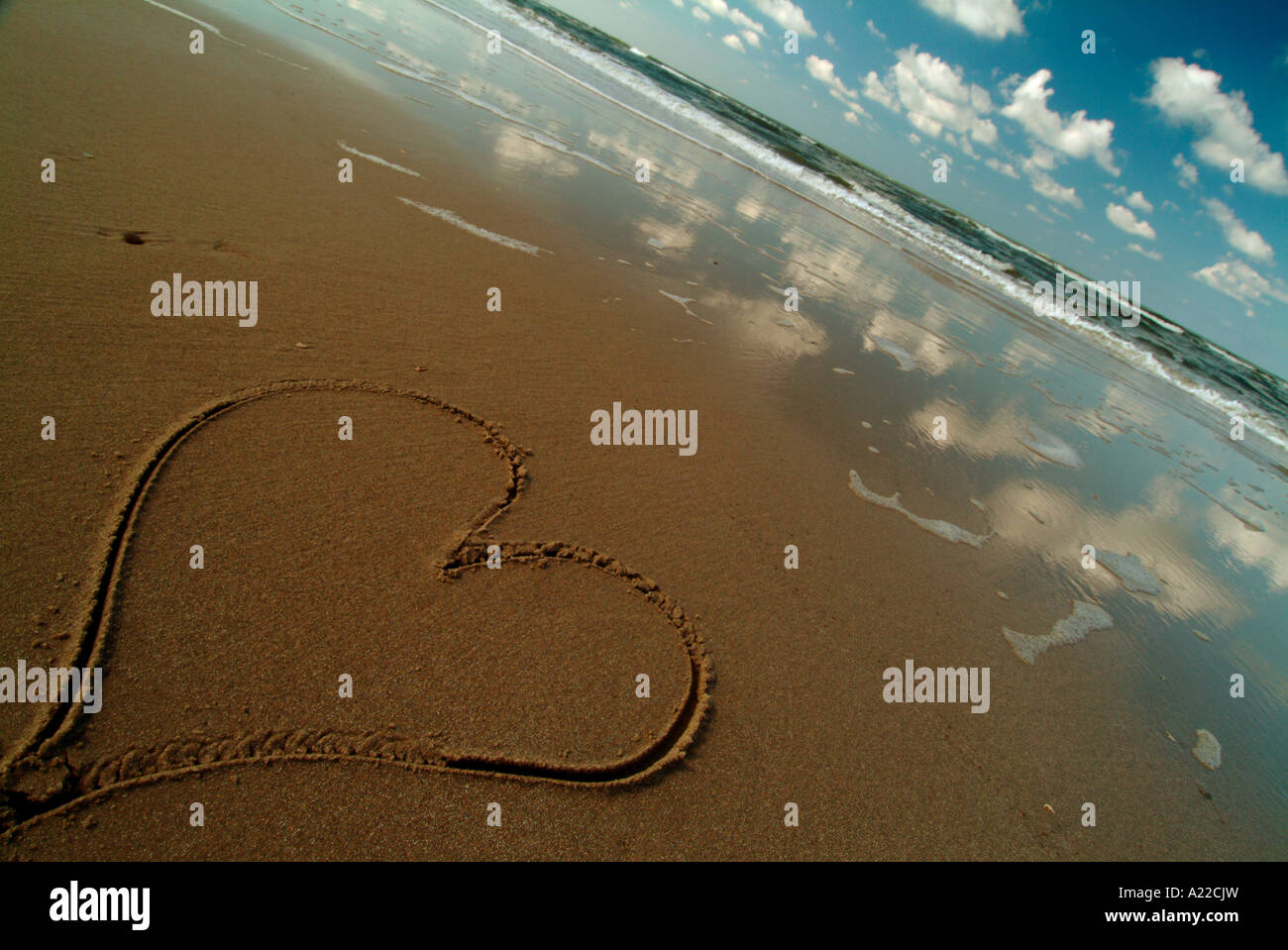 heart in sand Stock Photo - Alamy