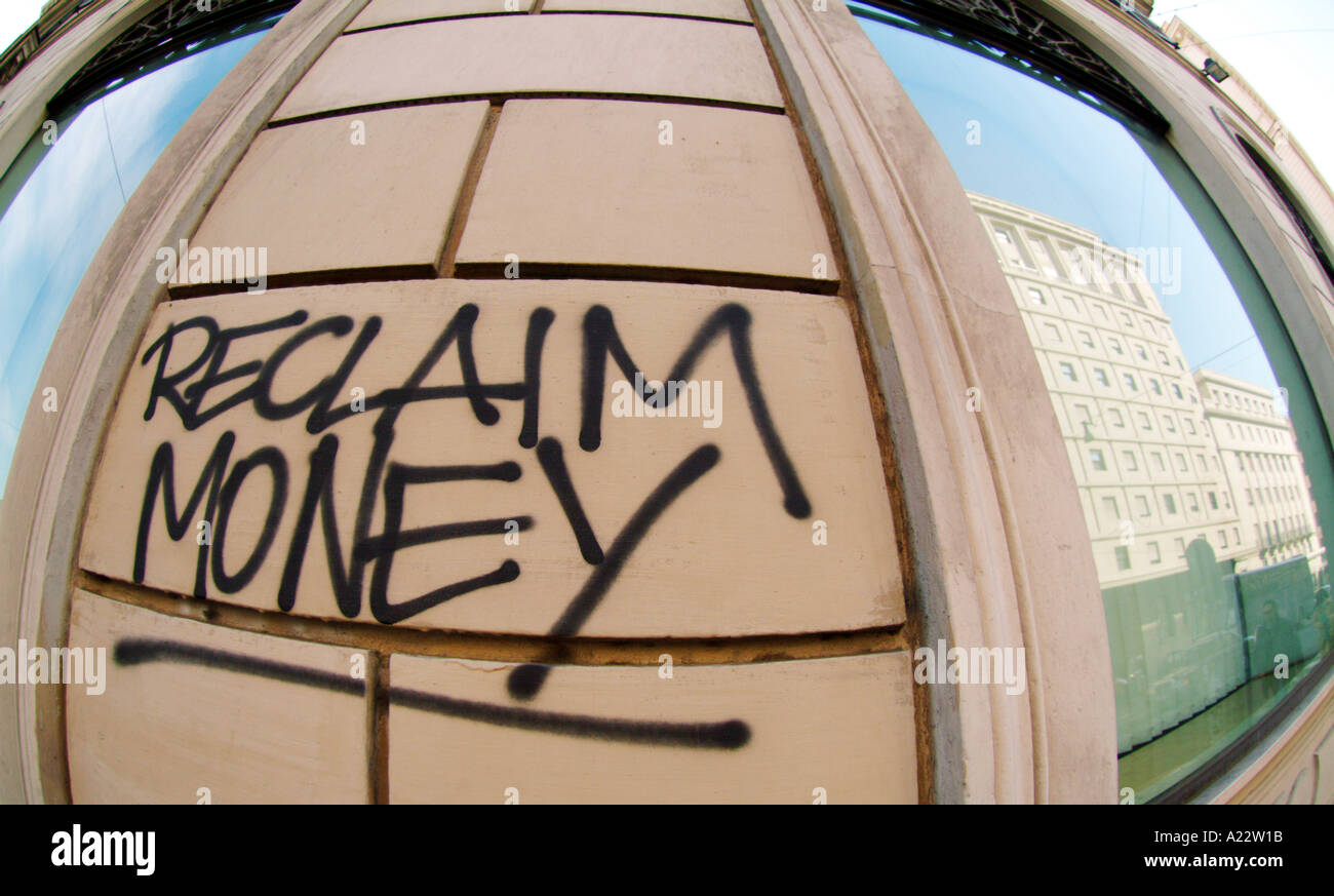 reclaim money graffiti via cavour Rome Stock Photo - Alamy