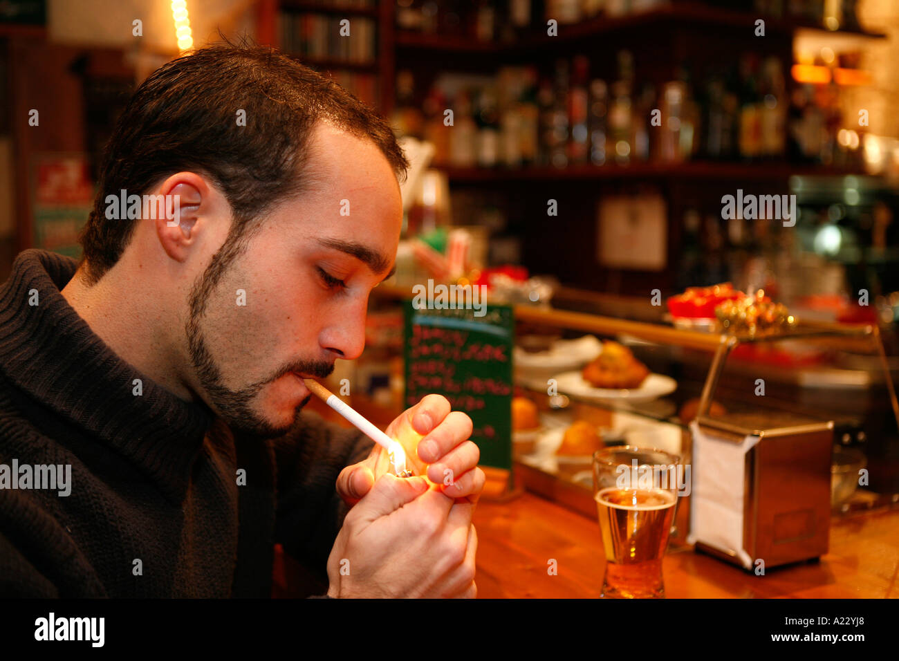 Smoker in a bar in Barcelona EUROPE SPAIN Stock Photo - Alamy