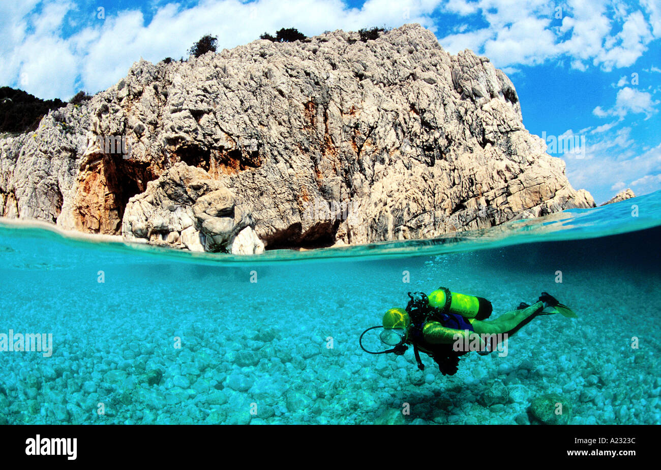 scuba diver in the mediterranean sea split image Stock Photo - Alamy