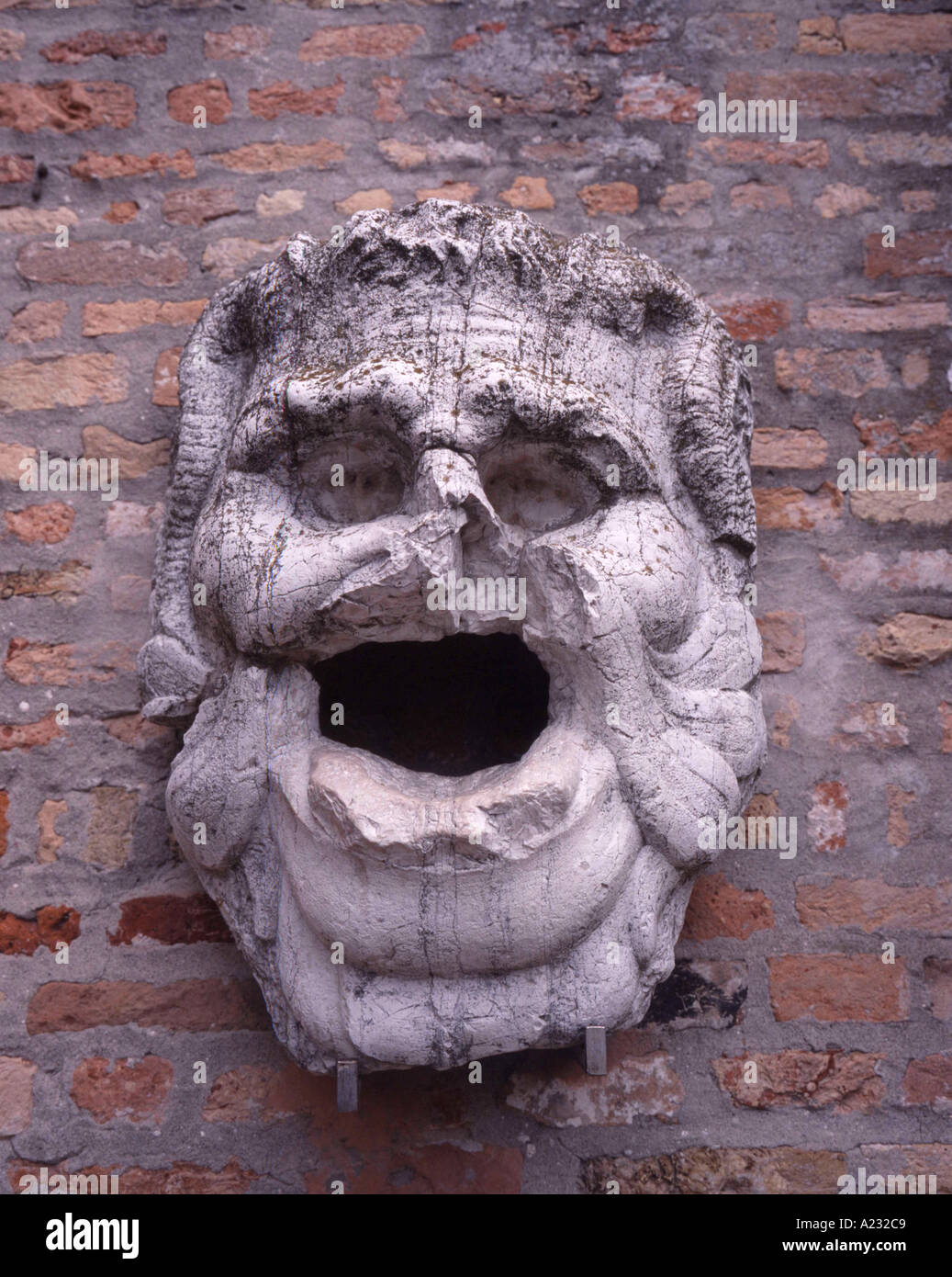 Stone gargoyle on wall Venice Italy Stock Photo - Alamy