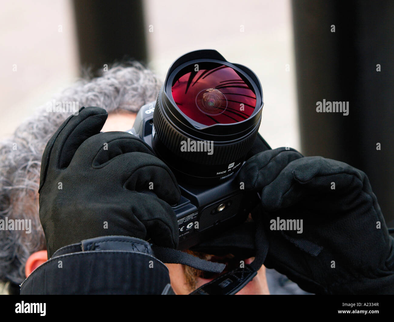 Man wearing gloves using power hi-res stock photography and images - Alamy