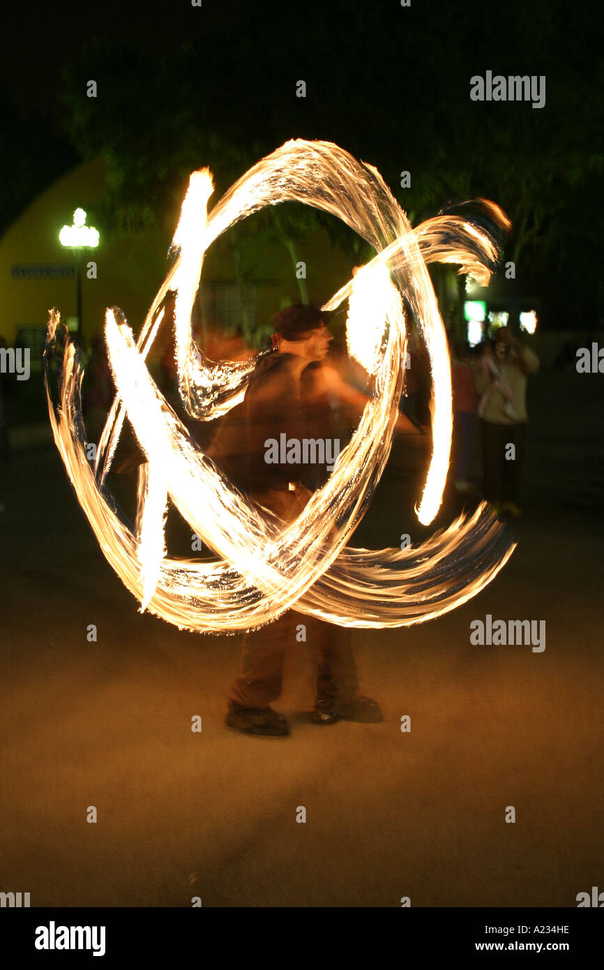 Fire juggler in Barcelona Stock Photo - Alamy