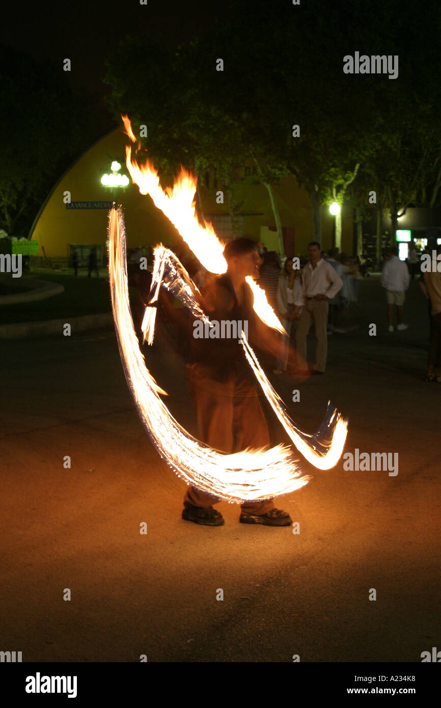 Fire juggler in Barcelona Stock Photo - Alamy