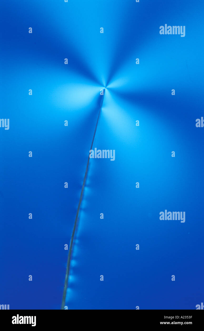 stress pattern at the tip of a crack in a piece of perspex revealed in ...