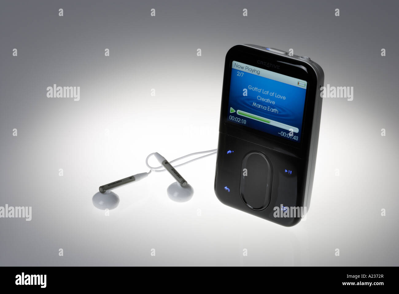 portable digital audio player and earphones Stock Photo - Alamy