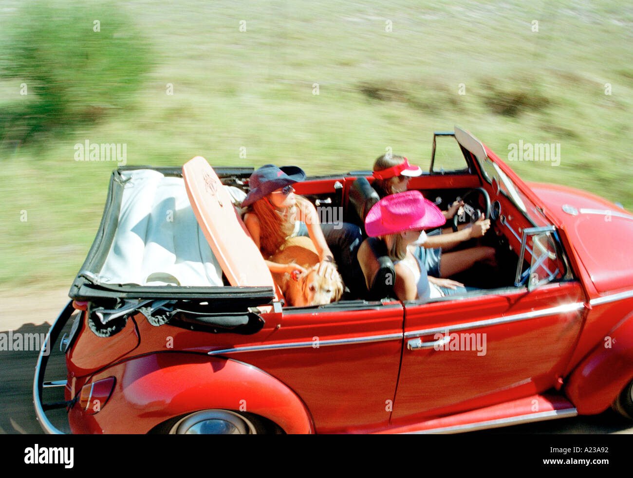 Women driving red convertible hi-res stock photography and images - Alamy