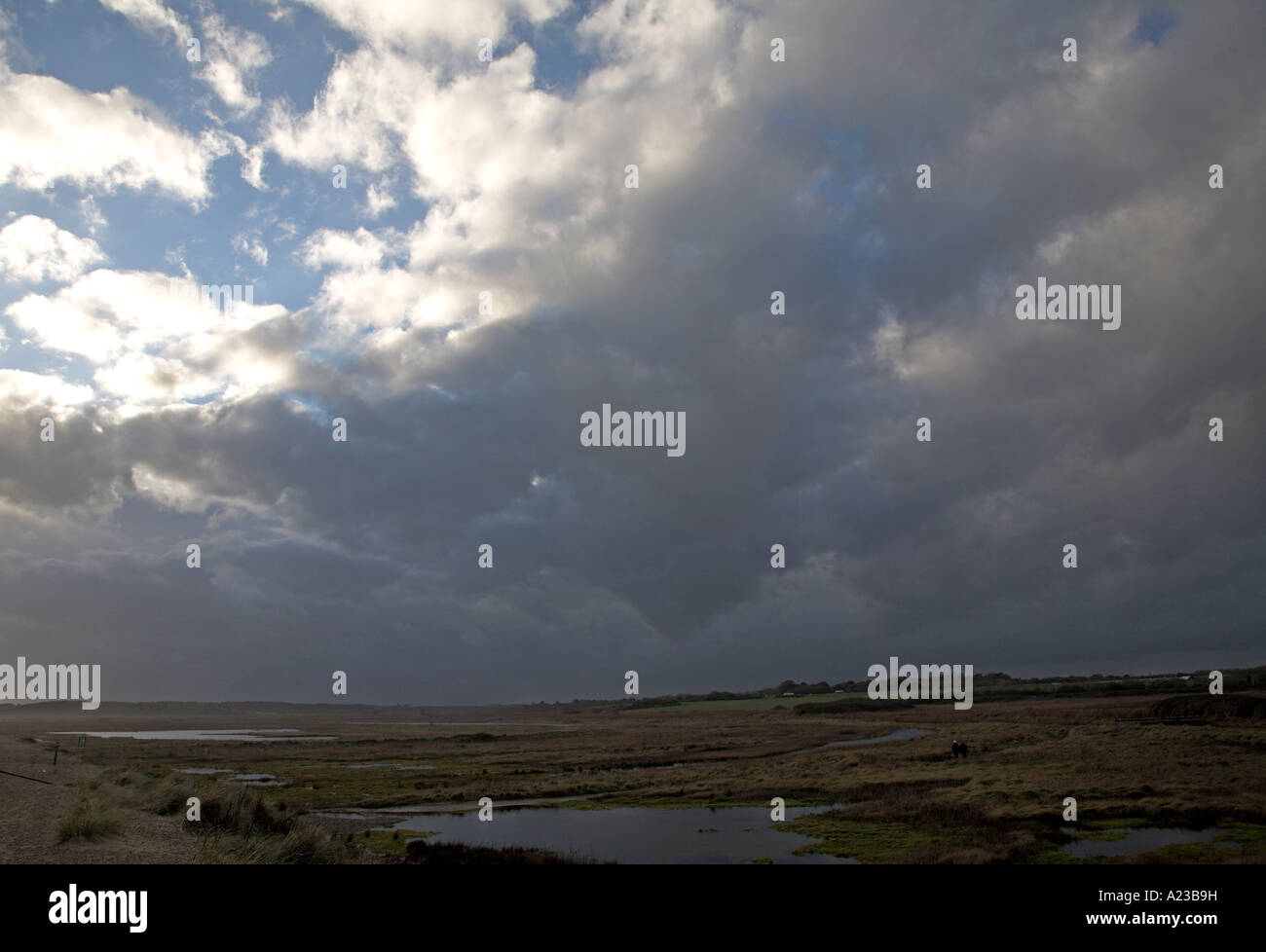 Large frontal rain clouds building up over marshes Walberswick, Suffolk ...
