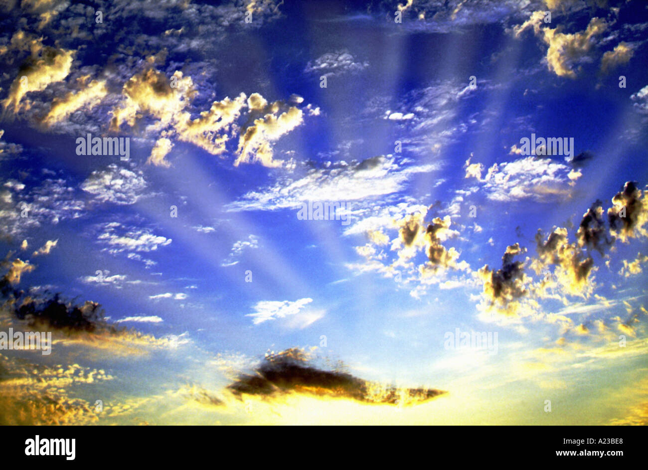 sunset sky with rays of sunlight Stock Photo - Alamy