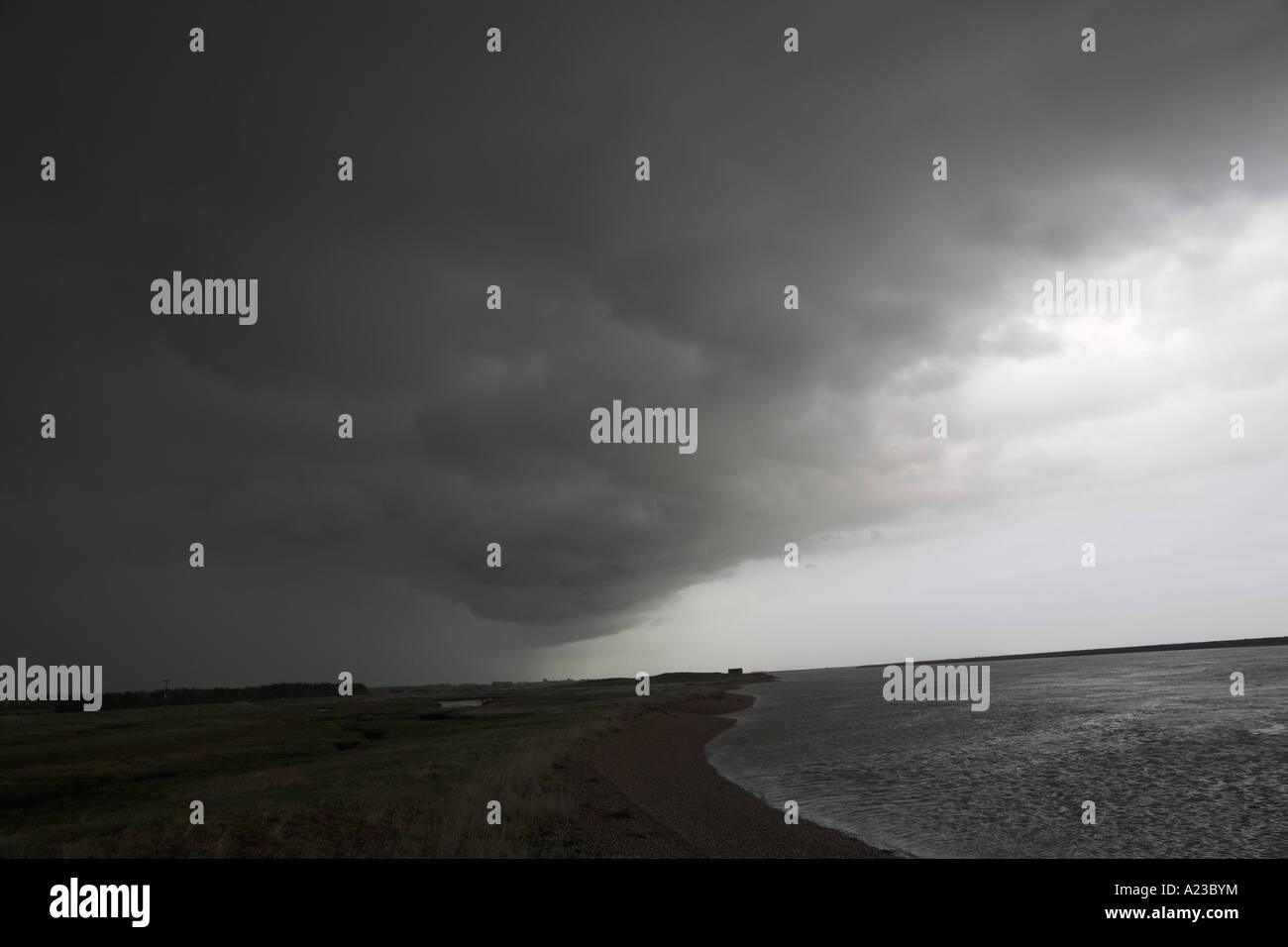 Dark clouds and heavy rain storm over River Ore Stock Photo - Alamy