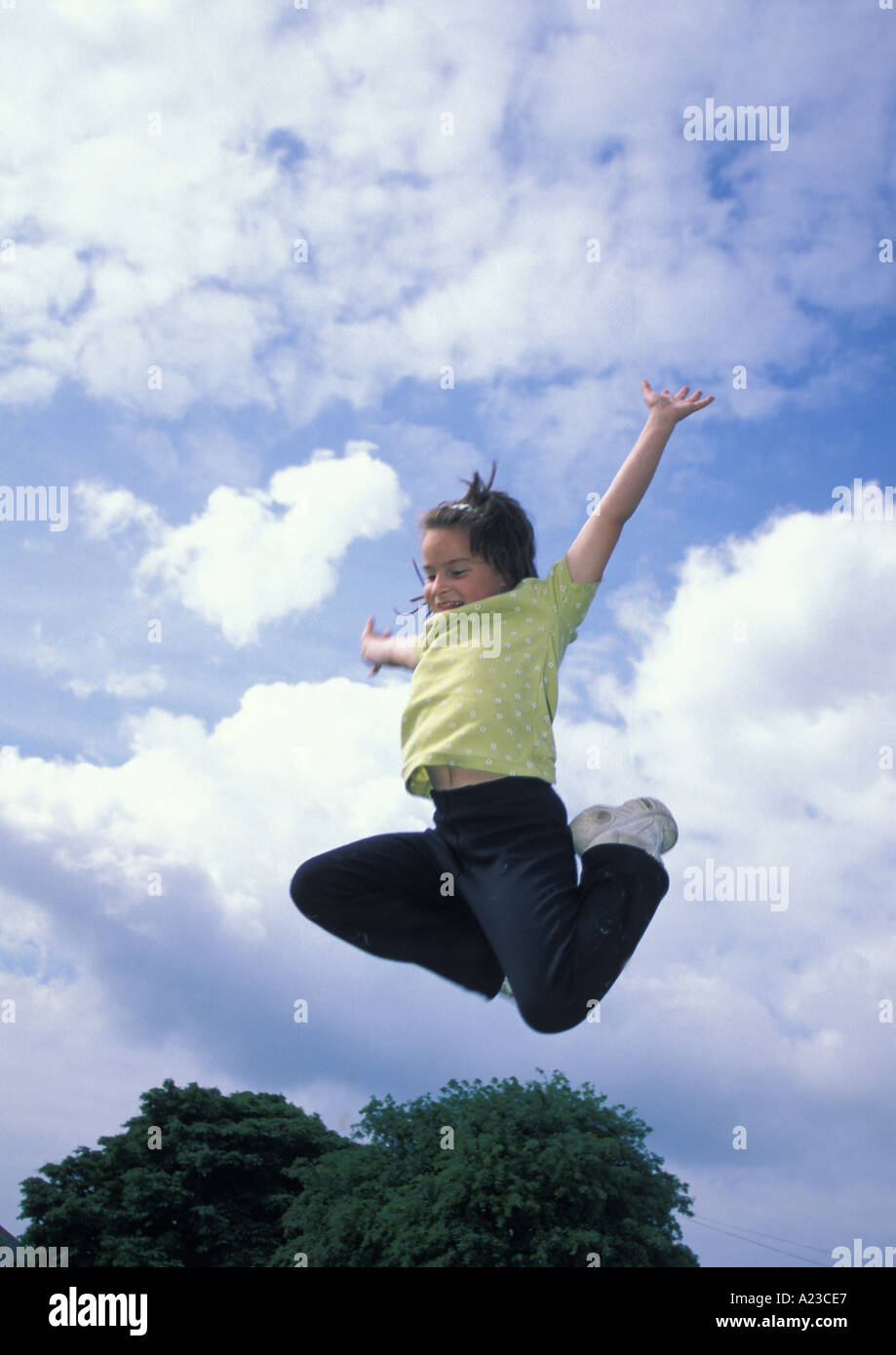 Girl Jumping In Air Stock Photo - Alamy