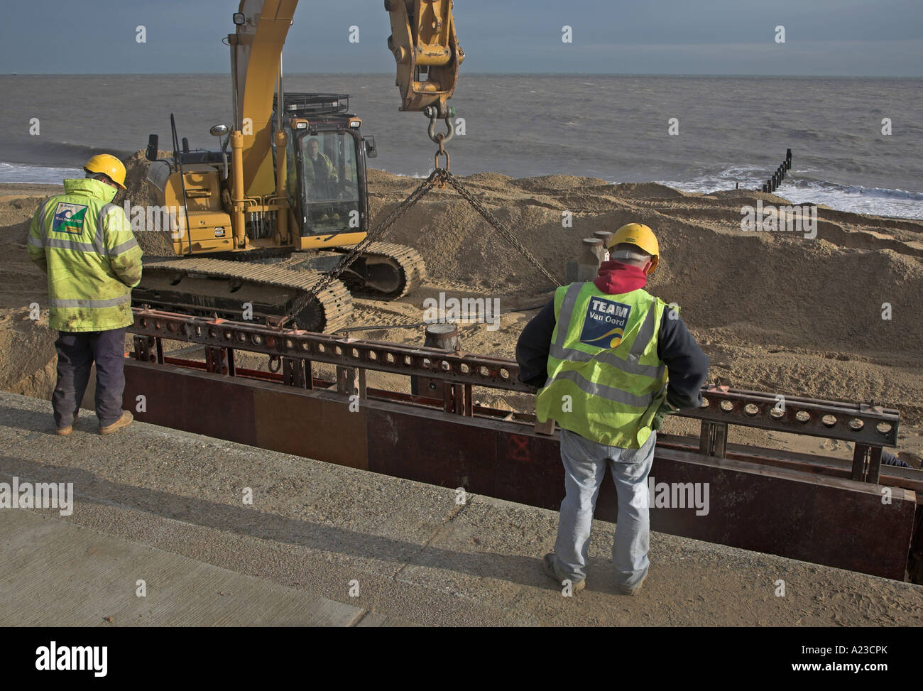 Engineering work to repair sea defences Stock Photo - Alamy