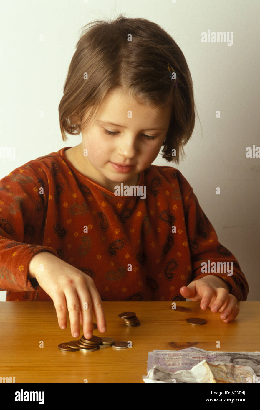 girl counting her money Stock Photo - Alamy