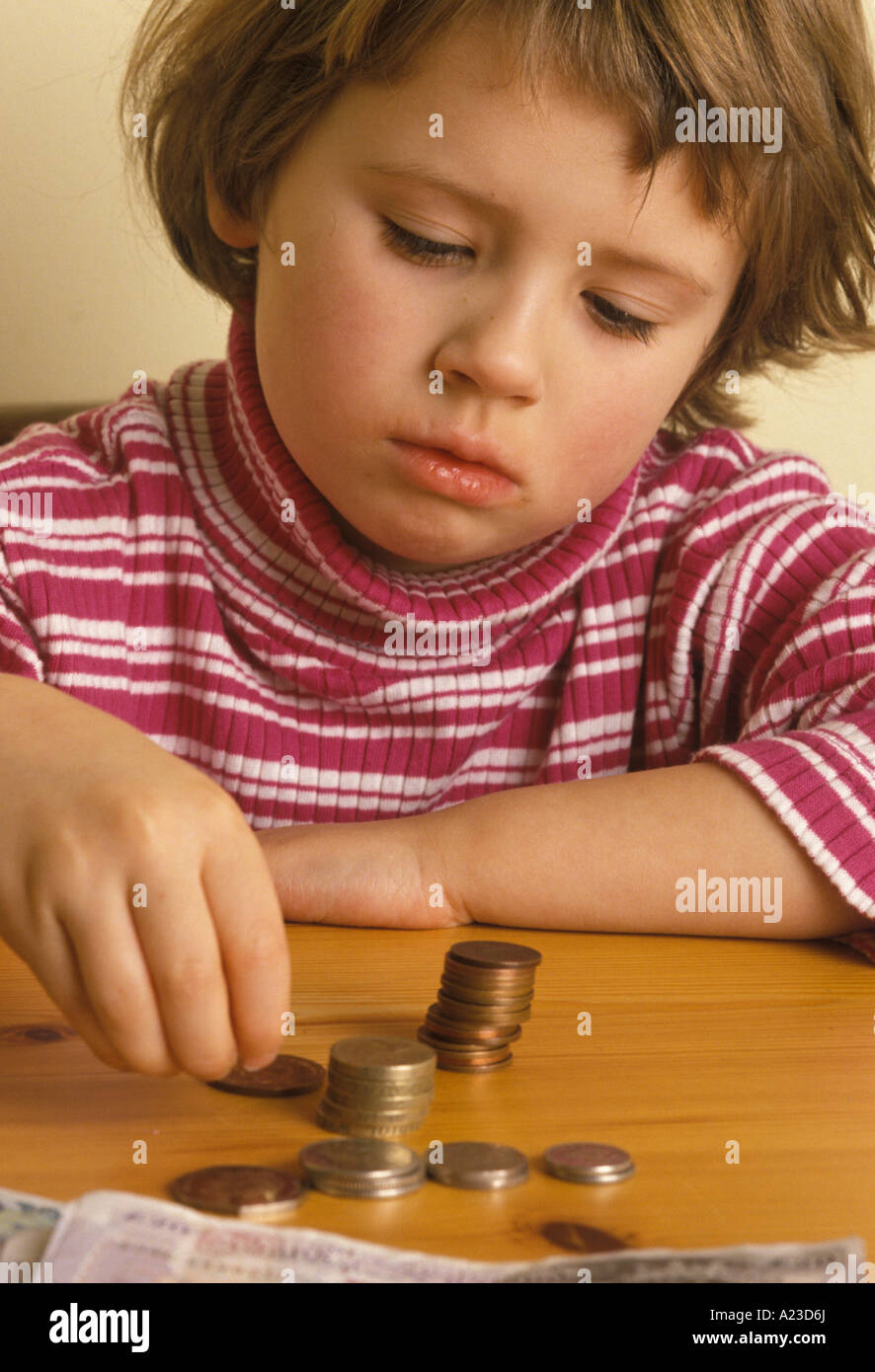 girl counting her money Stock Photo - Alamy