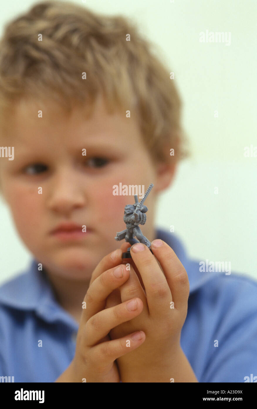 young boy with model toys Stock Photo - Alamy