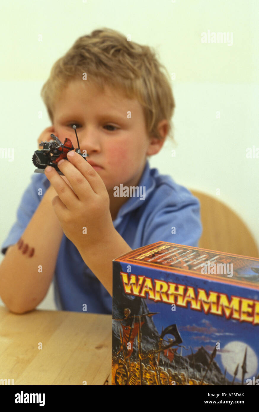 young boy with model toys Stock Photo - Alamy