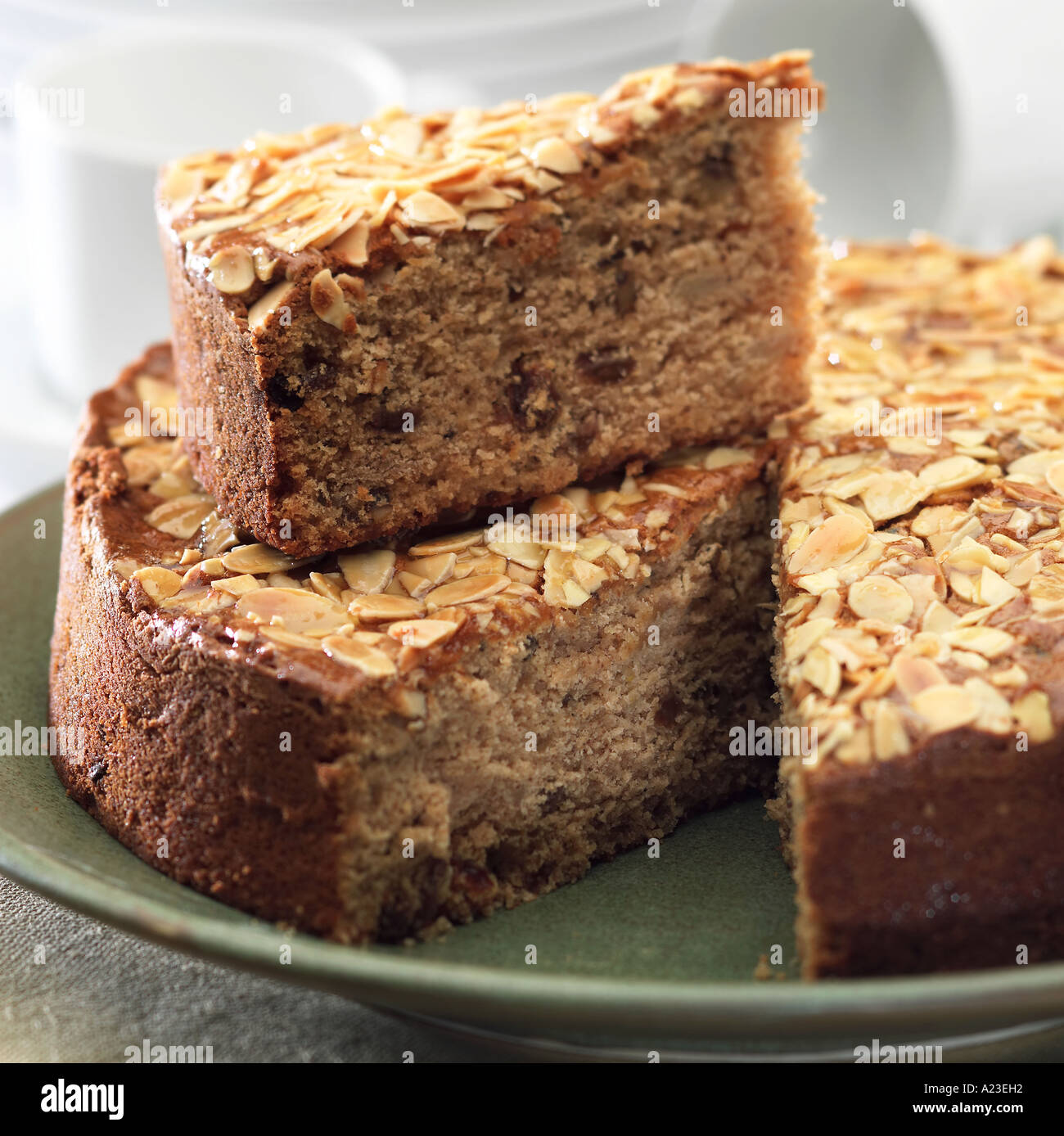Farmhouse cake whole cake with slice on top to show inside Stock Photo ...