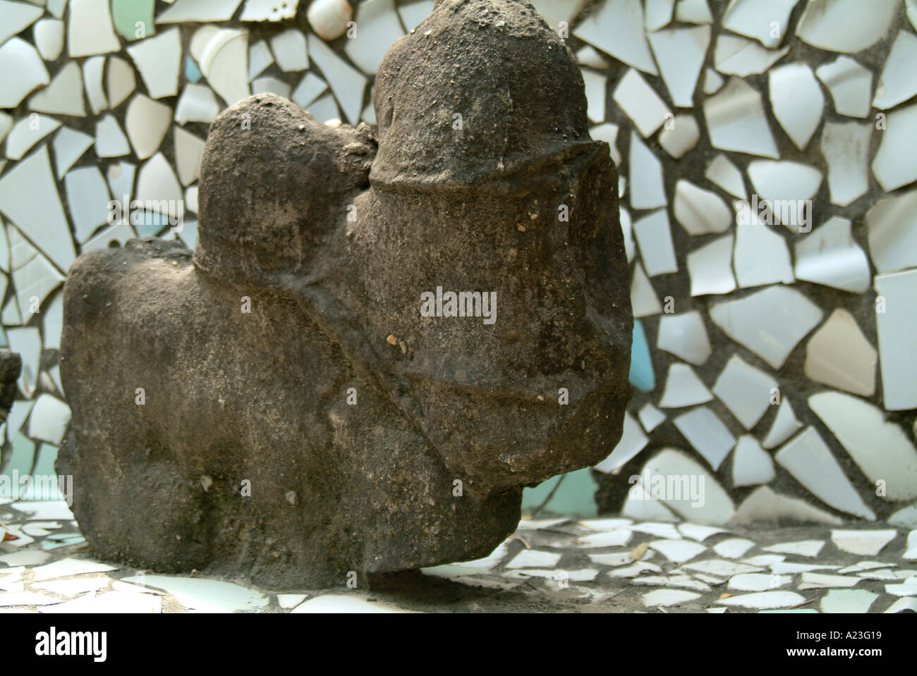 A natural stone rock shaped like a Bull Rock garden India Stock Photo ...