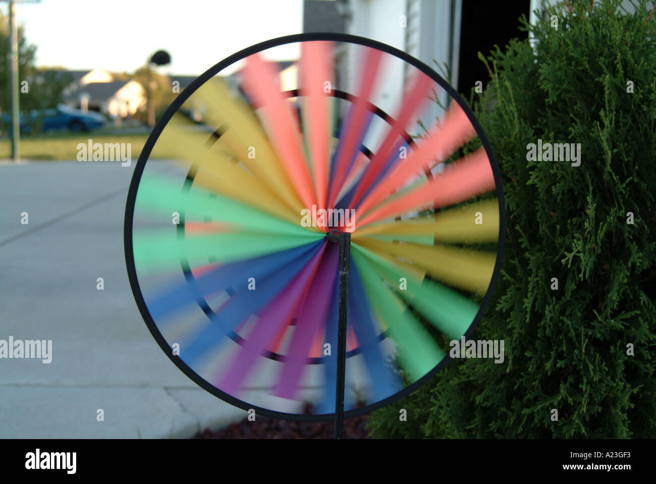 Rainbow colorful colourful little windmill Stock Photo - Alamy