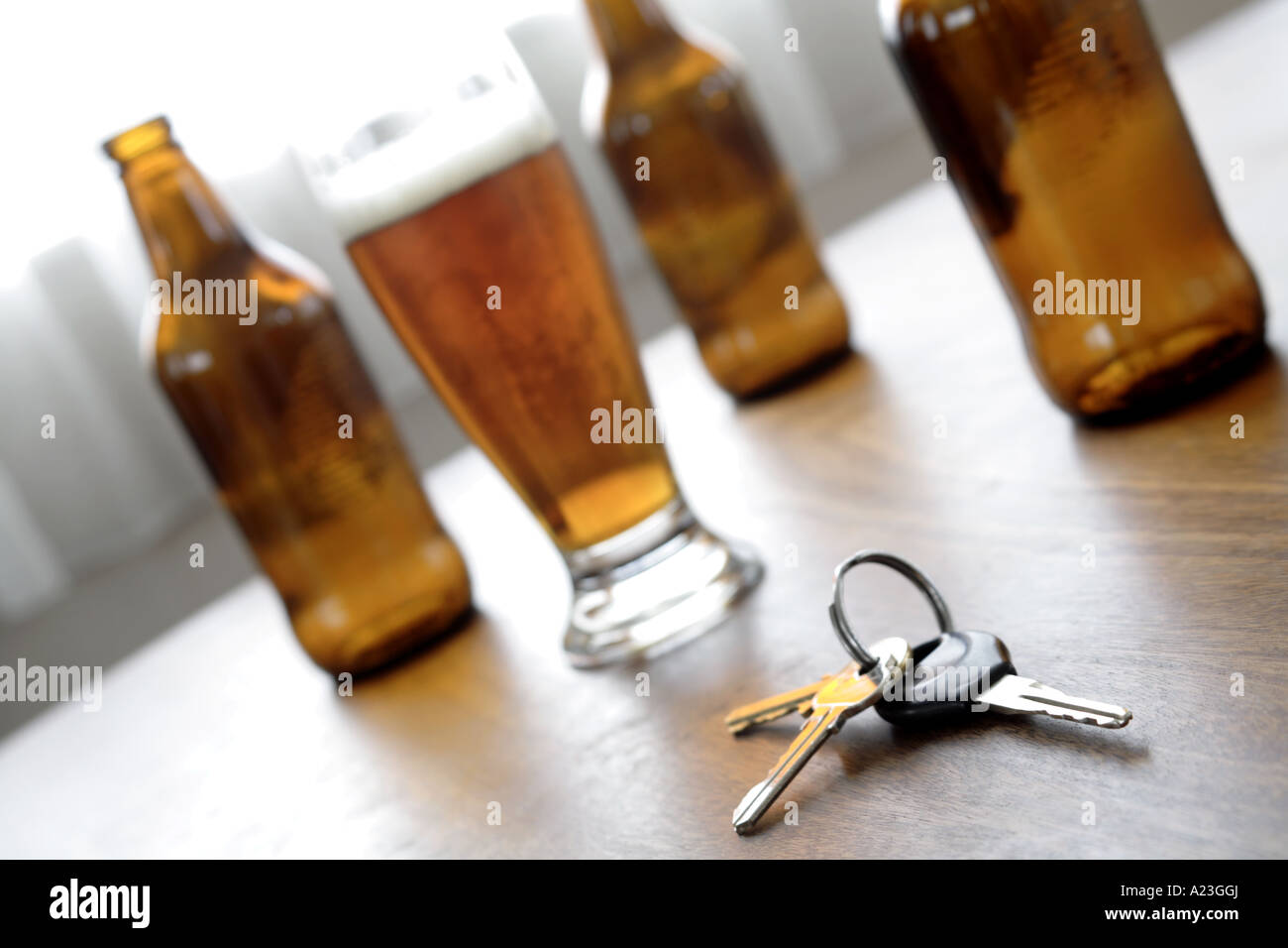 Beer and car keys Stock Photo - Alamy