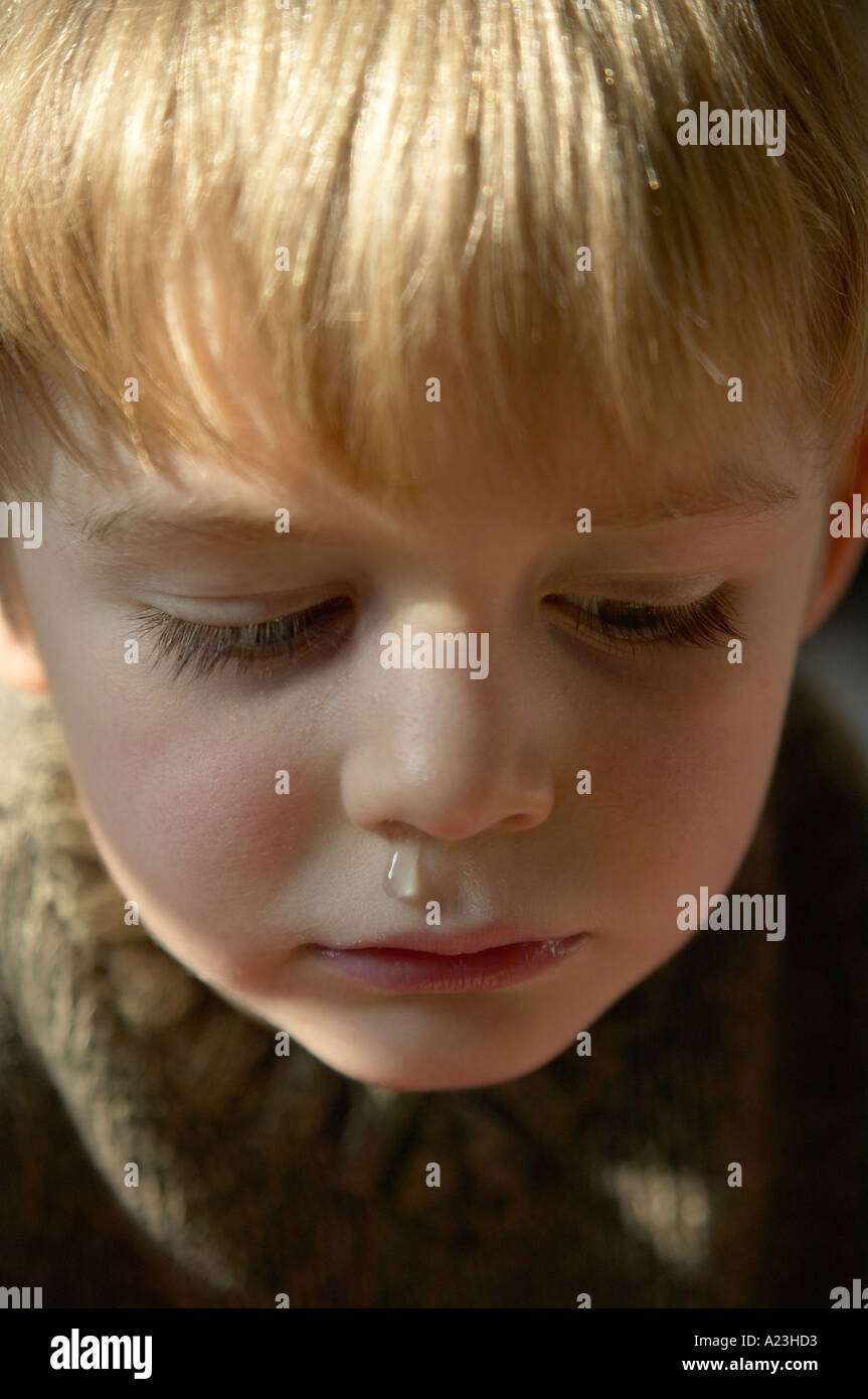 boy with running nose Stock Photo - Alamy