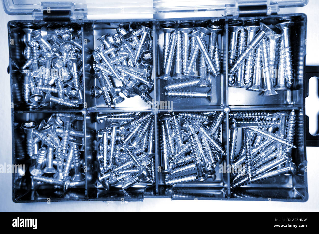 Screws in plastic container Stock Photo - Alamy