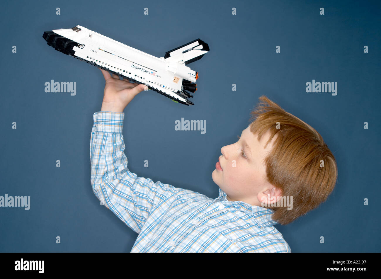 boy playing with space shuttle model Stock Photo - Alamy