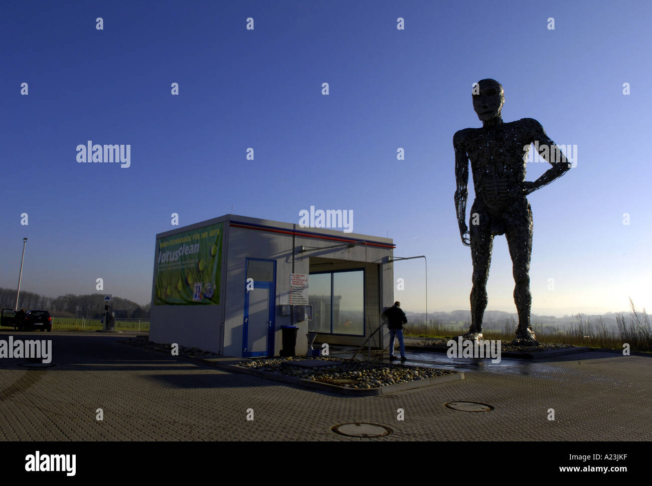 metal man male sculpture art artwork statue huge massive imposing giant ...