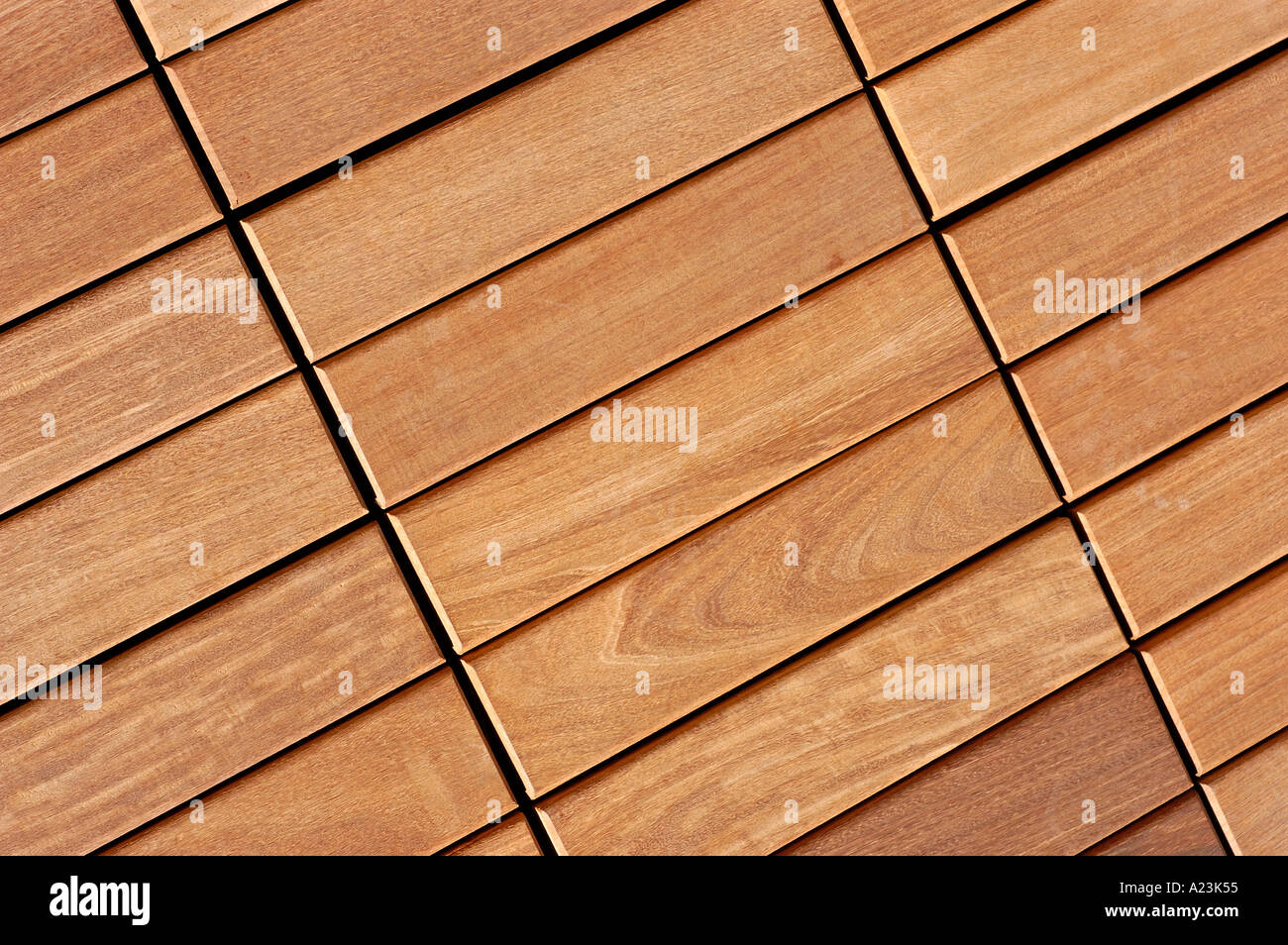 Teca Teka wood floor bricks Stock Photo - Alamy