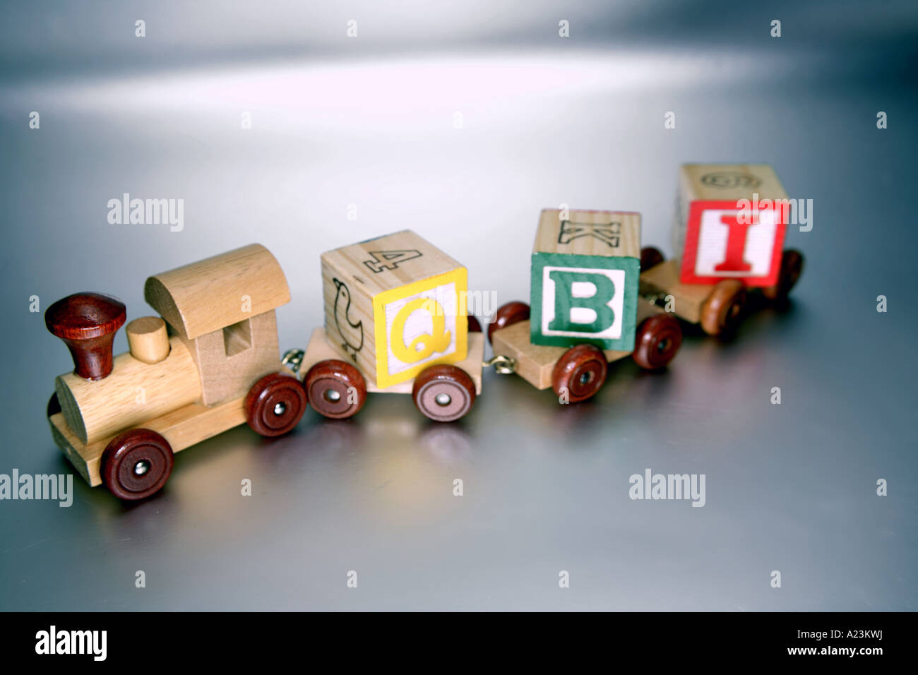 Learning blocks on toy train Stock Photo - Alamy